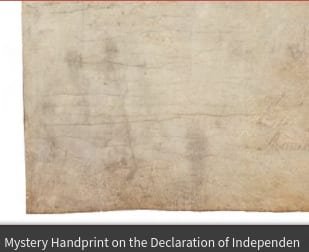 Heart handprint on Declaration Independence | VT Foreign Policy